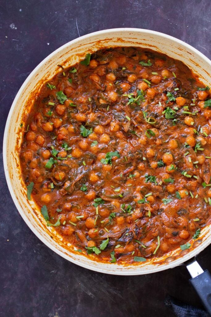 Harissa Chickpeas with Caramelized Onions and Greens
